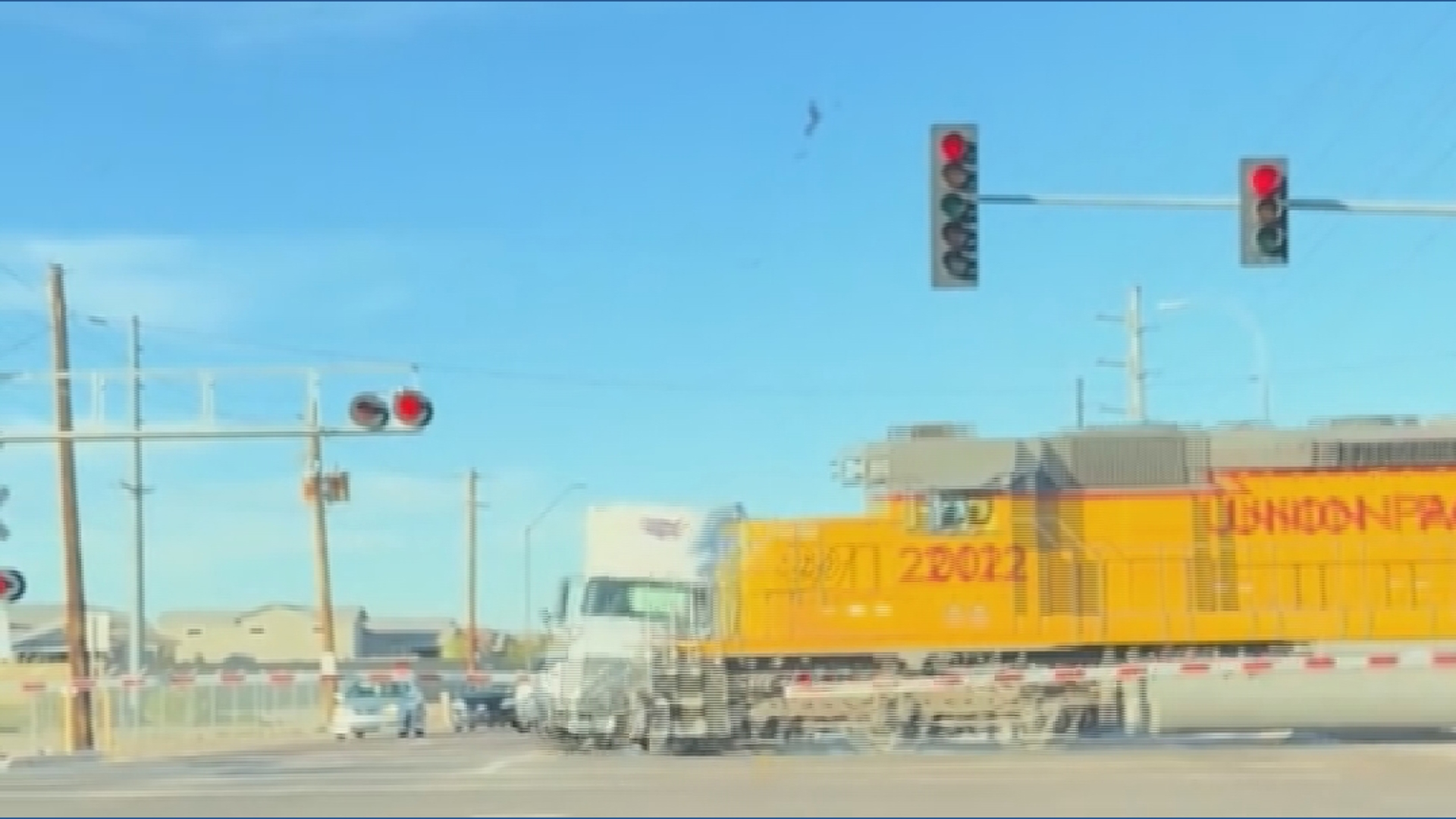 Watch: Train plows into stuck semi truck in the West Valley
