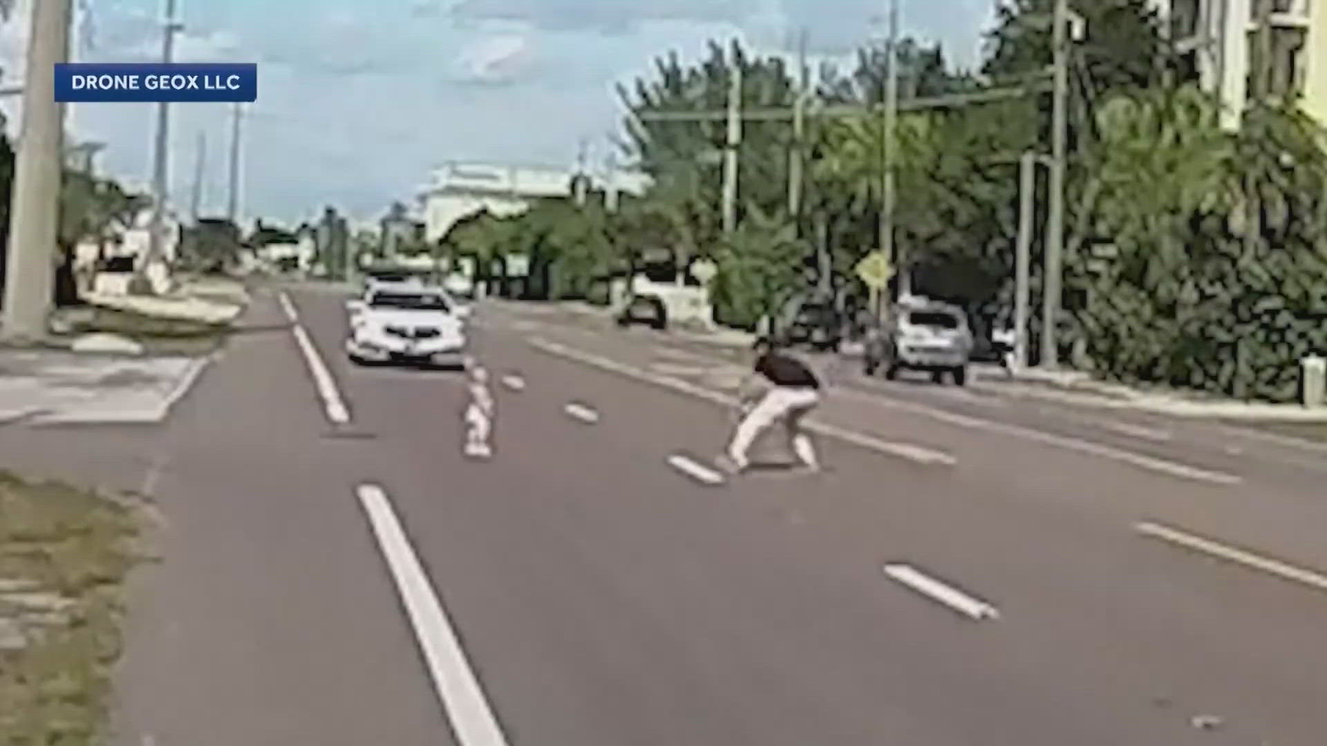 Caught on camera: Man rescues three toddlers from busy roadway