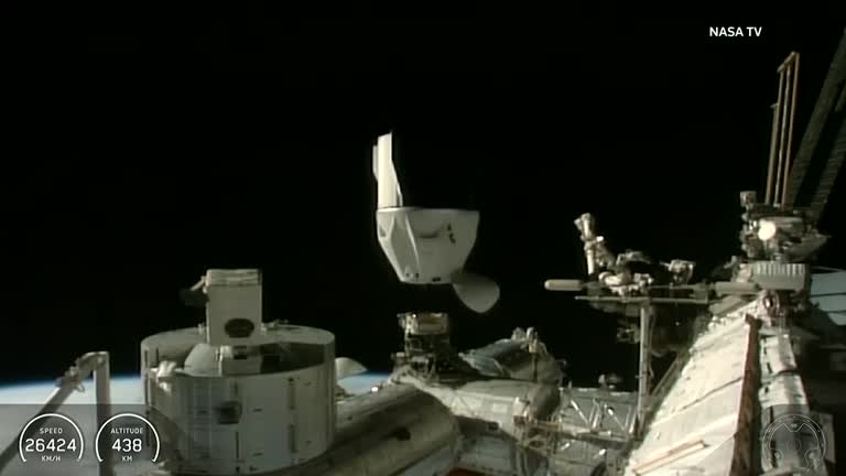 SpaceX crew capsule begins early return flight to Earth