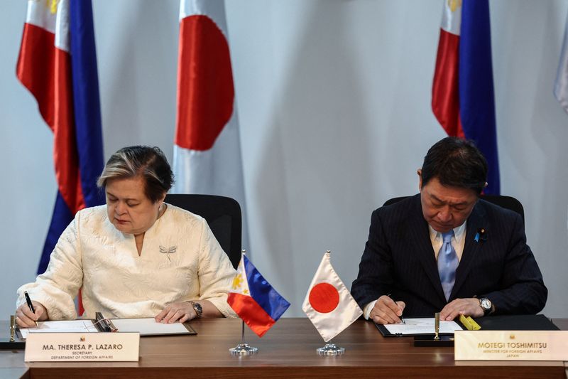 Japan, Philippines sign new security pacts as regional tensions rise