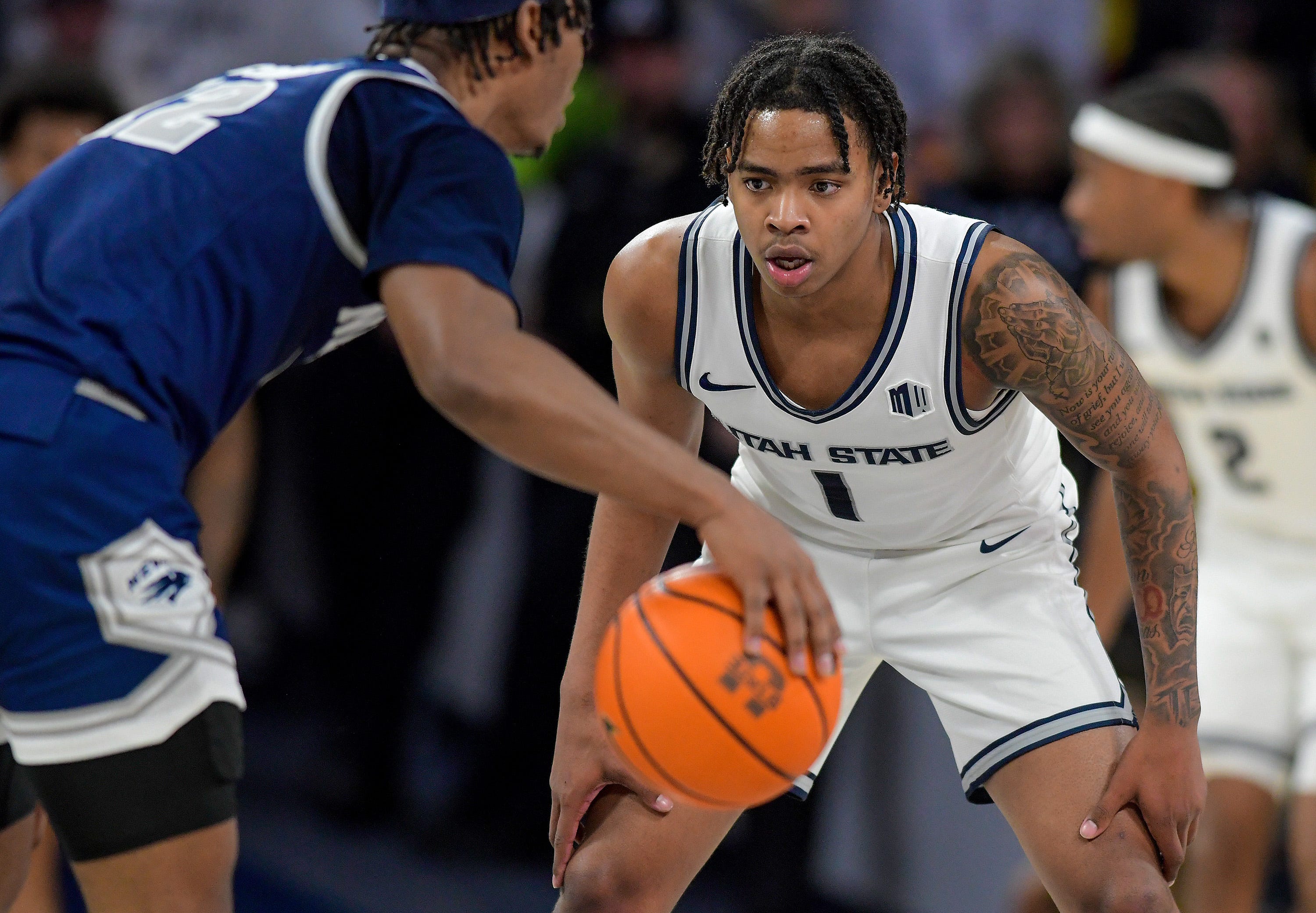 Utah State pulls away late to down Nevada, 71-62, on Wednesday