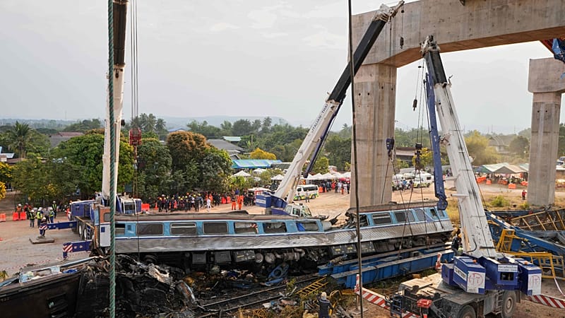 Crane falls on train in Thailand, killing at least 30 and injuring ...