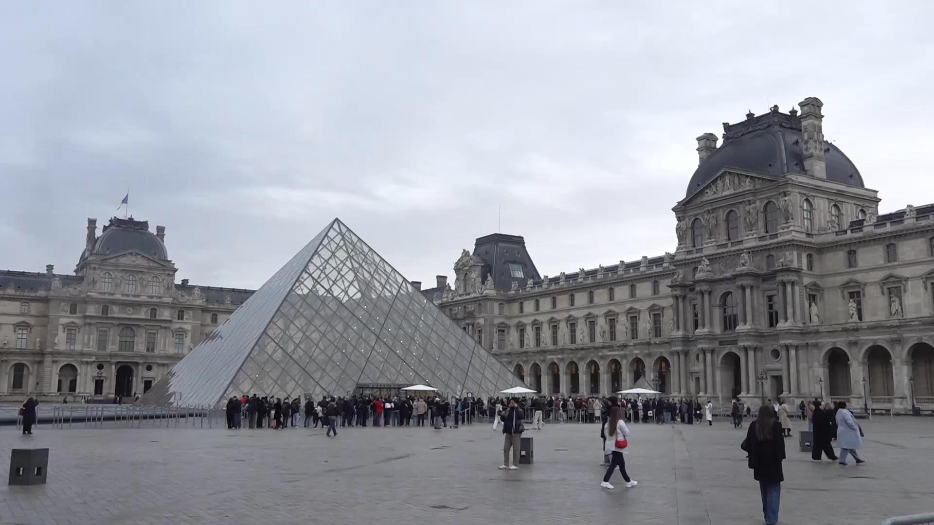 Visitors react to price hike for most non-Europeans at Paris' Louvre to ...