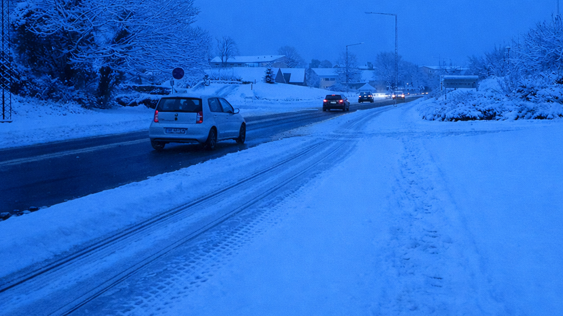 Where does this snowy road lead