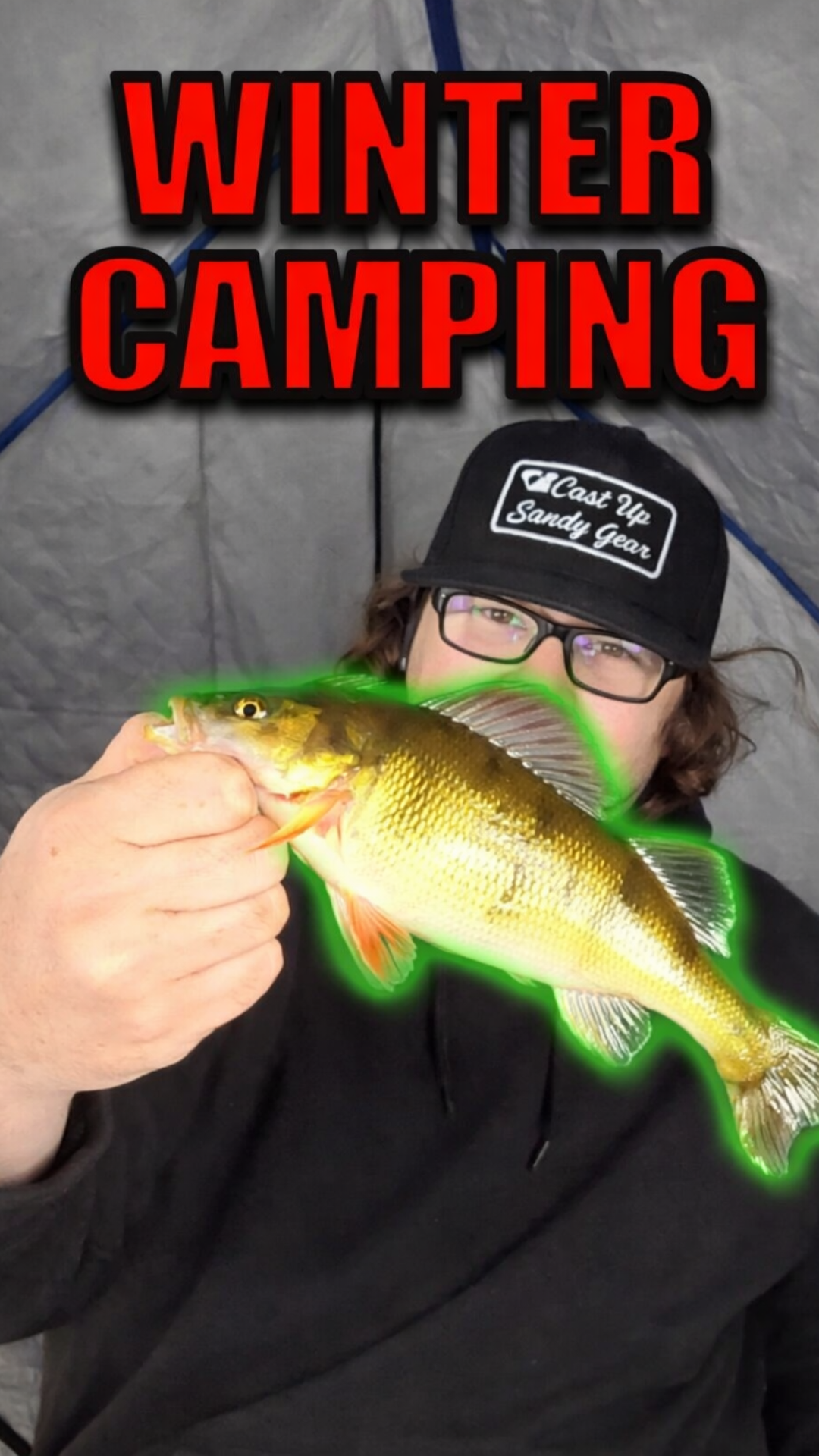 Winter camping day fishing for perch from the bedside