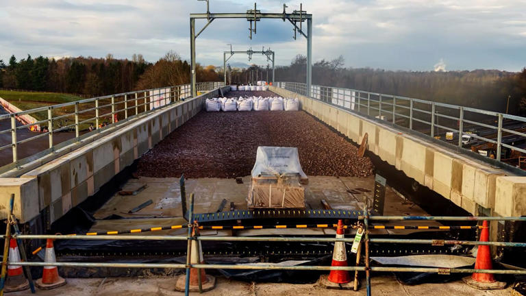 First train due over newly installed rail bridge