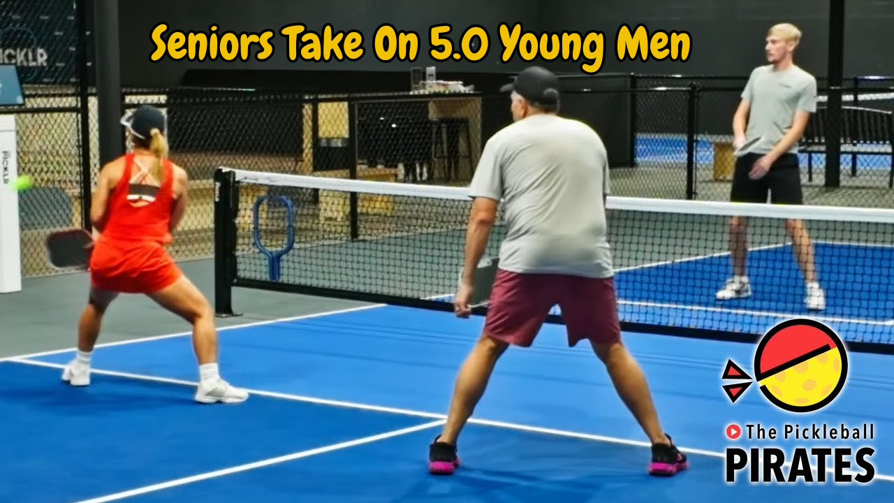 Competitive 5.0 pickleball between senior mixed and young men