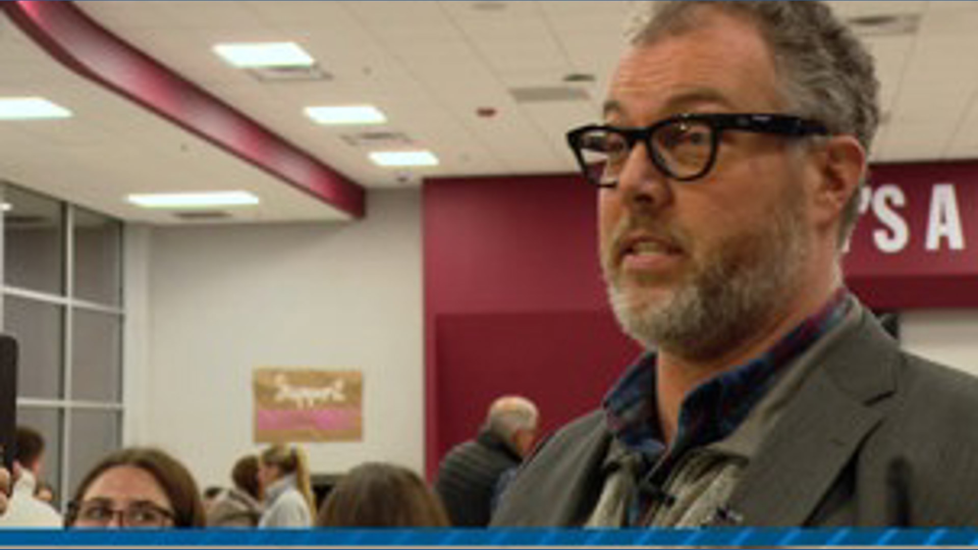 Ben Reno-Weber reacts to Highlands gun store