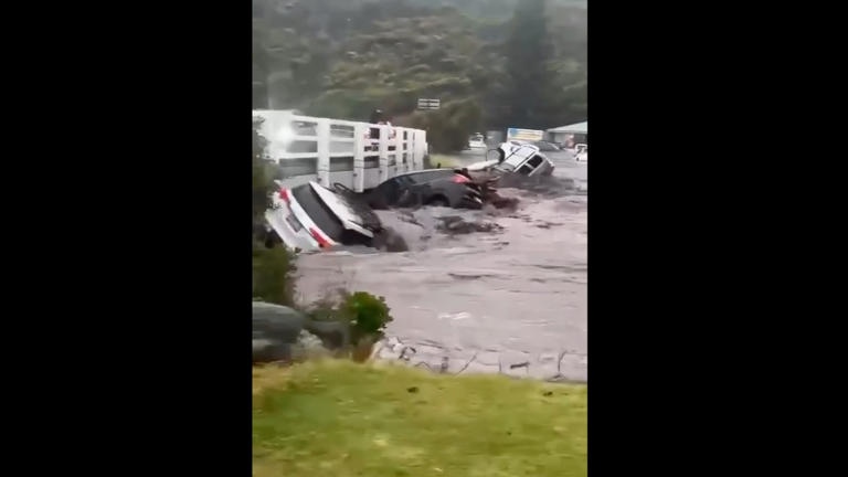 One rescued, dozens of cars swallowed by flash flooding at Victorian ...