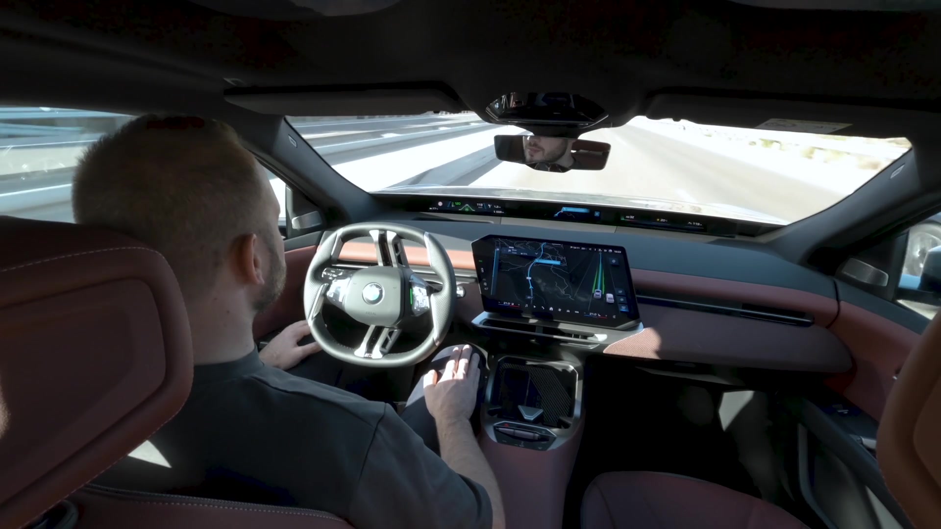 The new BMW iX3 50 xDrive. Polarized grey metallic. Navigation-guided ...