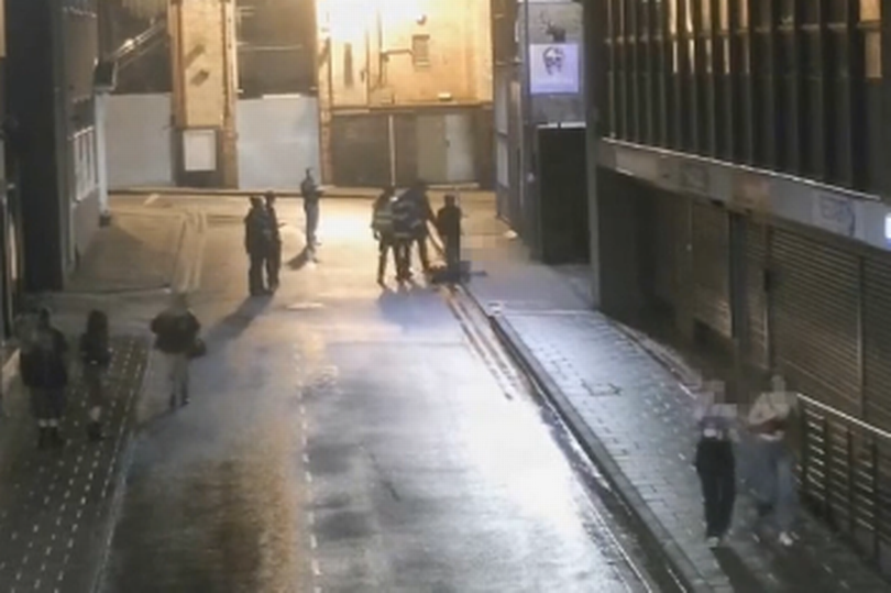 Moment bouncer knocks reveller out in Midlands city centre during ...