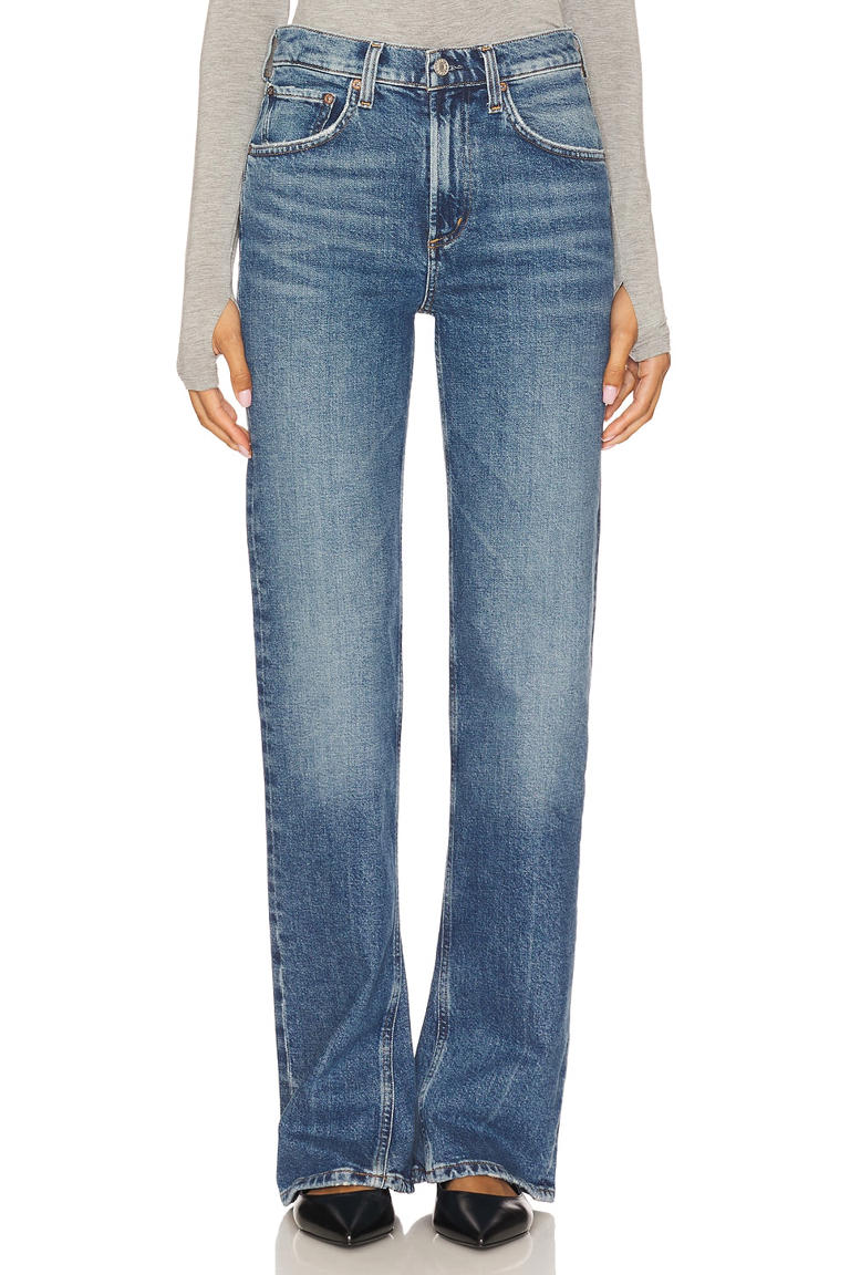 Don't panic—every cool girl is wearing tights under jeans