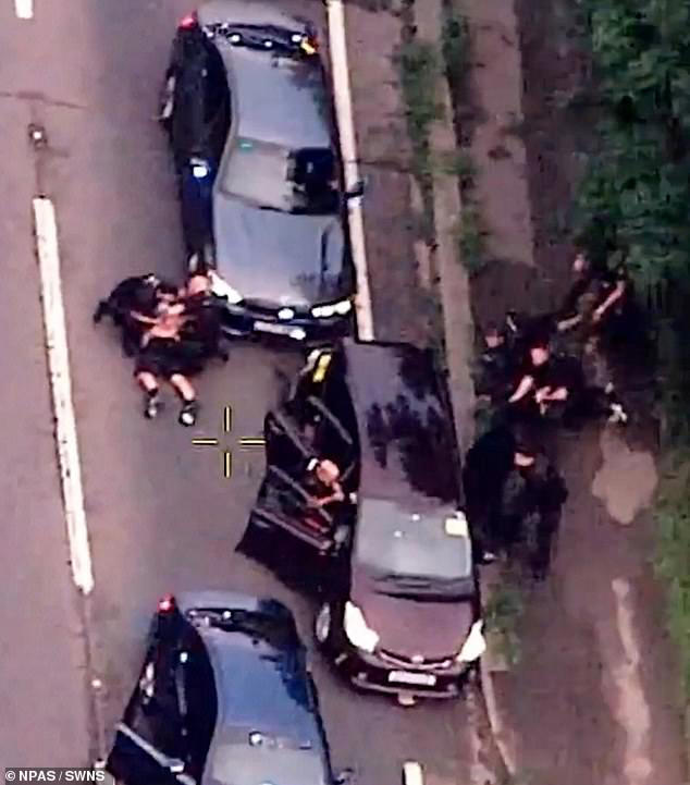 Moment police ram taxi carrying two British drug cartel kingpins as ...