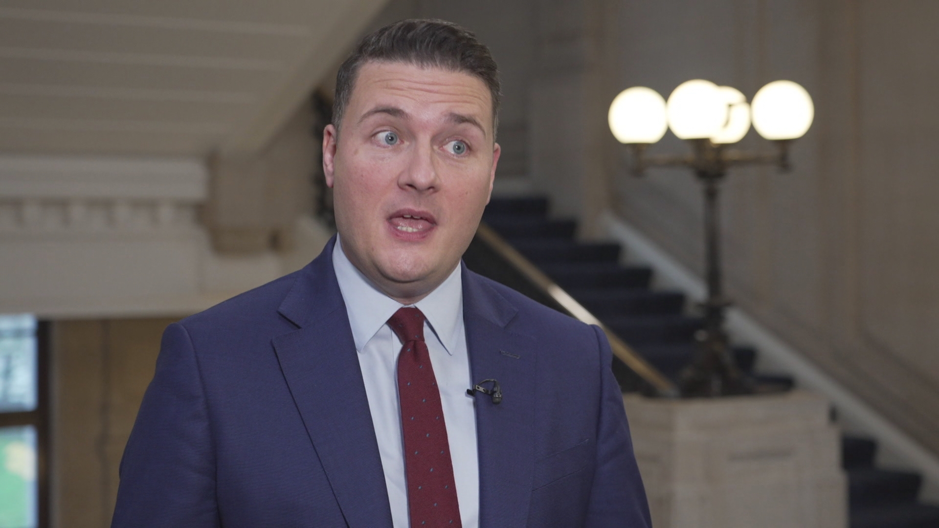 Health secretary apologises to patients on corridors