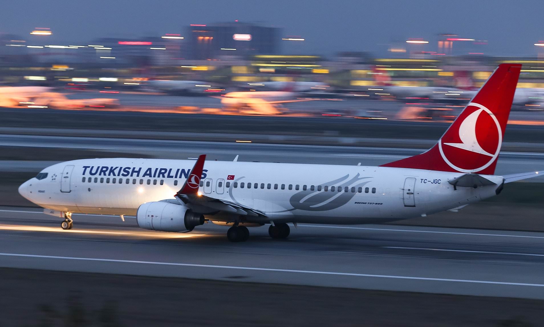 Passenger jet is surrounded by cops at Barcelona airport amid 'on board ...