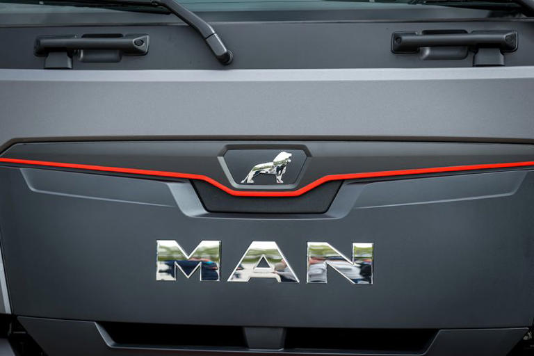 Truck maker MAN announces investment and cuts in deal to save jobs