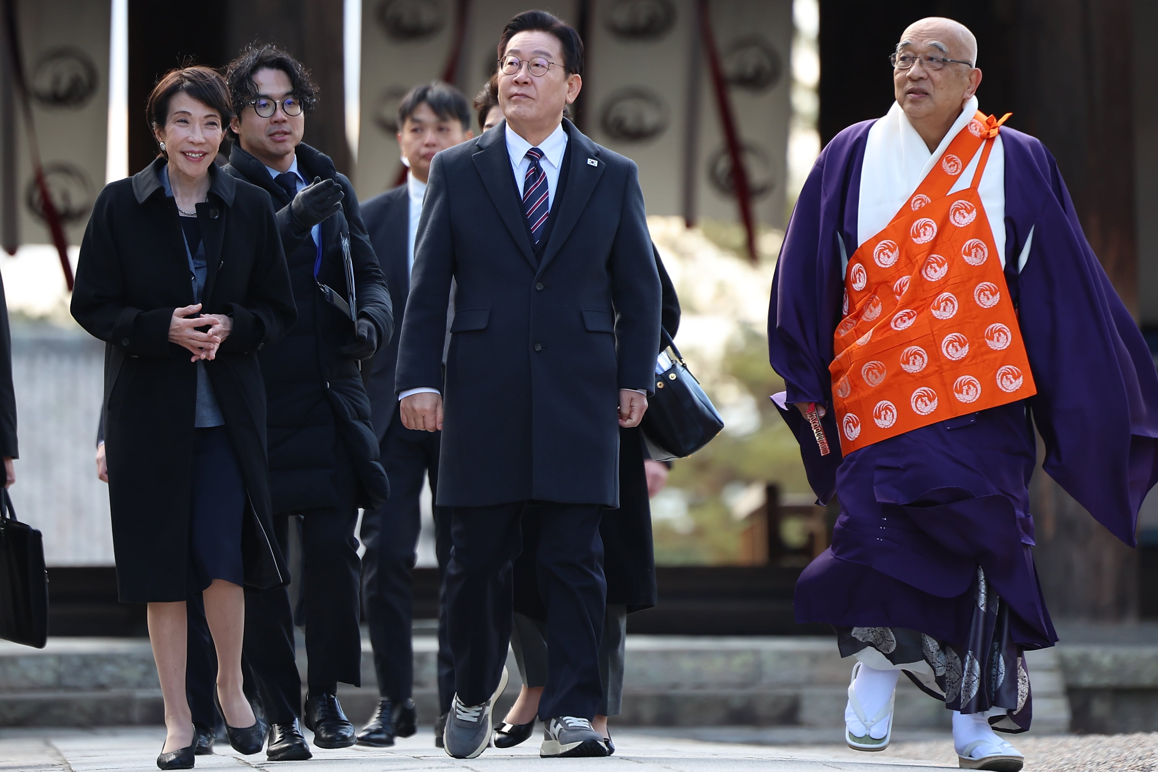 President Lee Jae-myung borrows sneakers for Japan temple visit