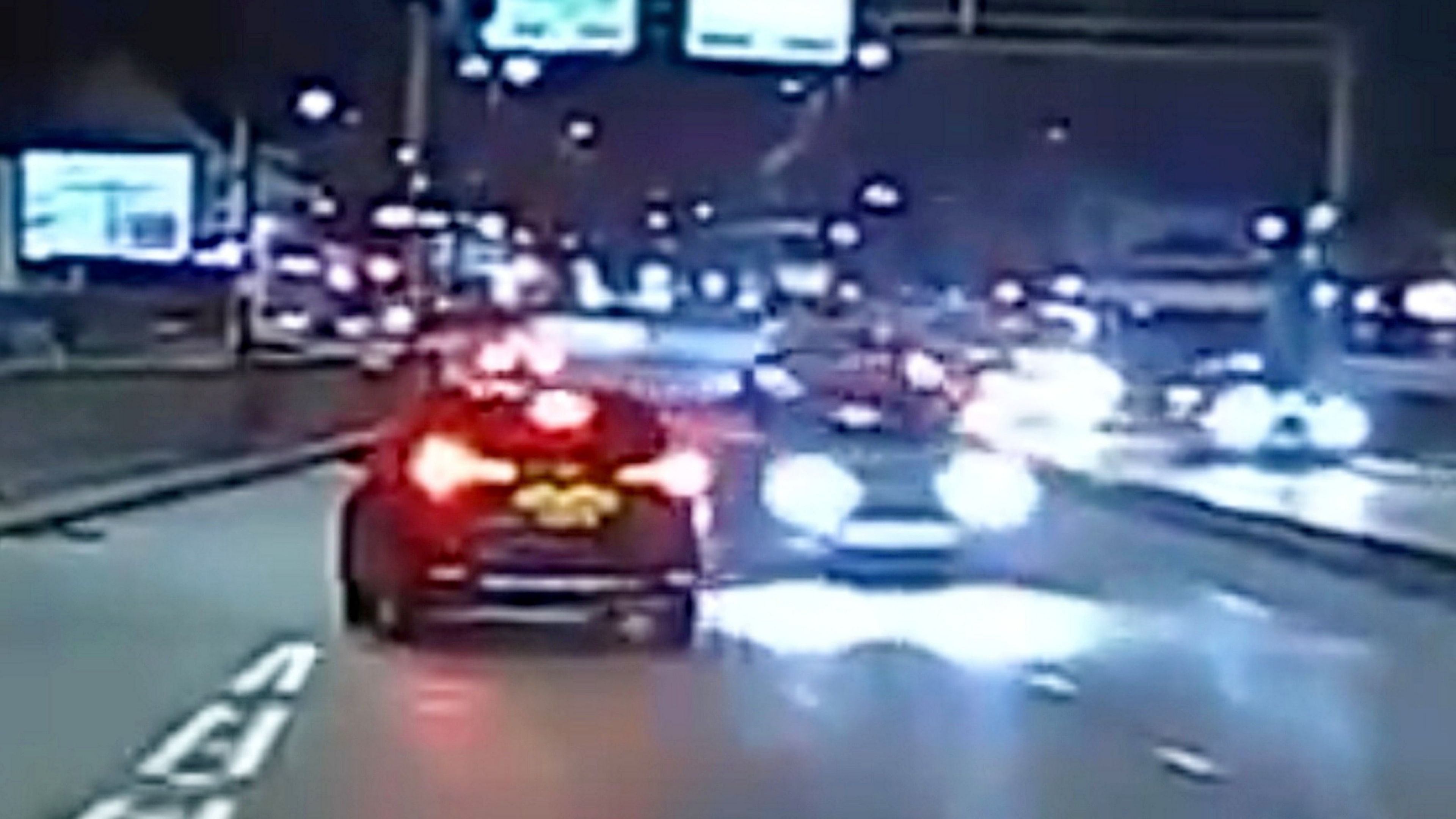Driver narrowly avoids huge crash after hurtling wrong way down dual ...