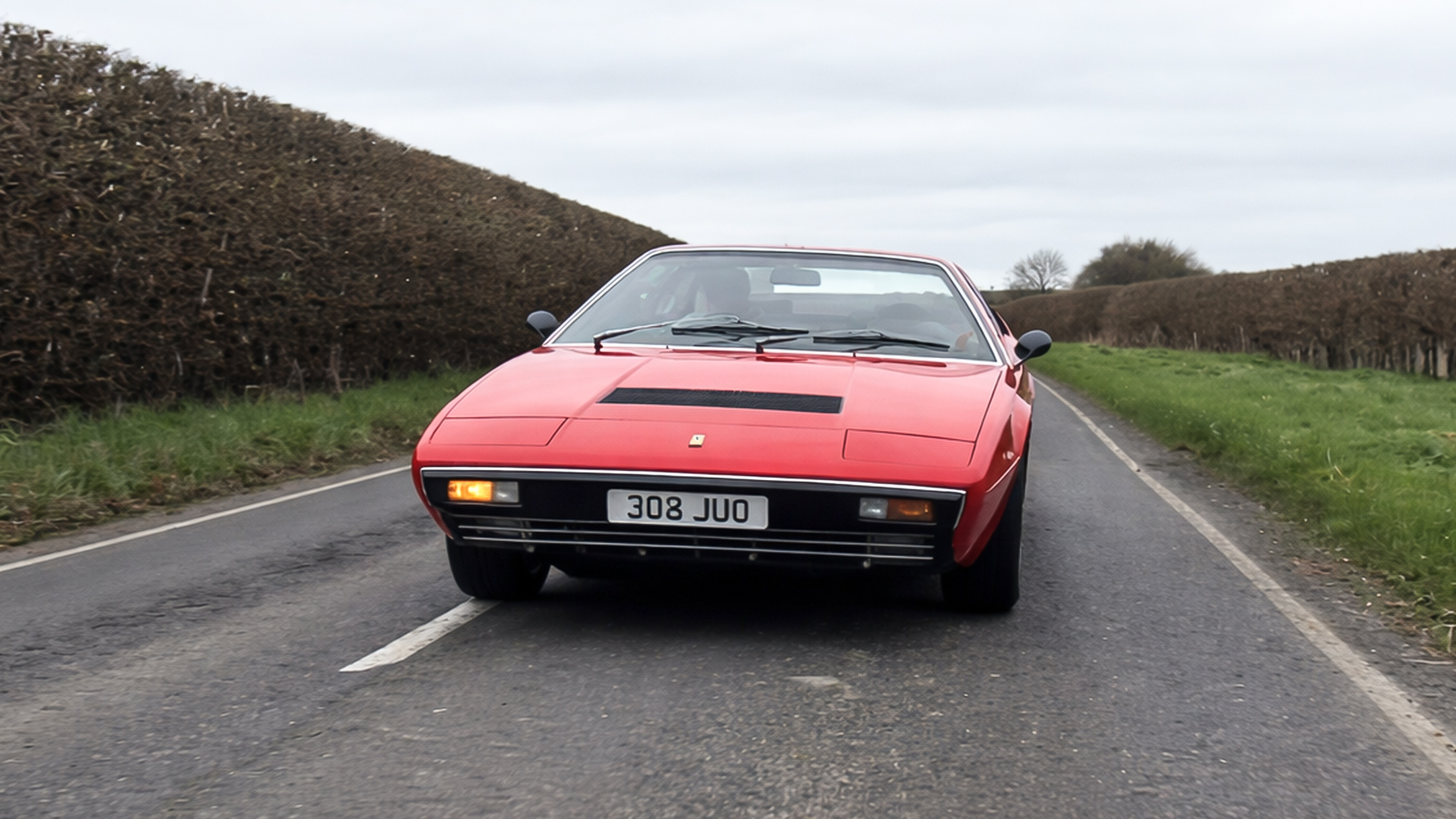 What makes the Ferrari 308 GT4 so unique?