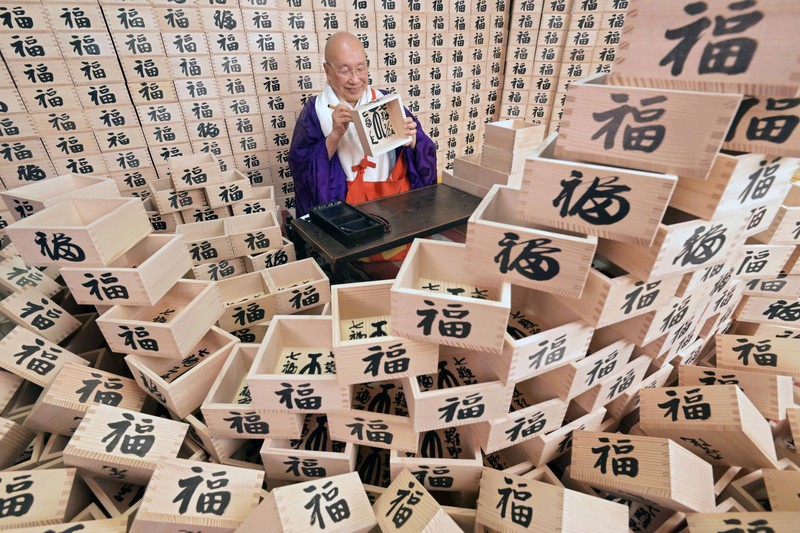 Lucky box production in full swing at temple in Japan's Aichi ahead of ...