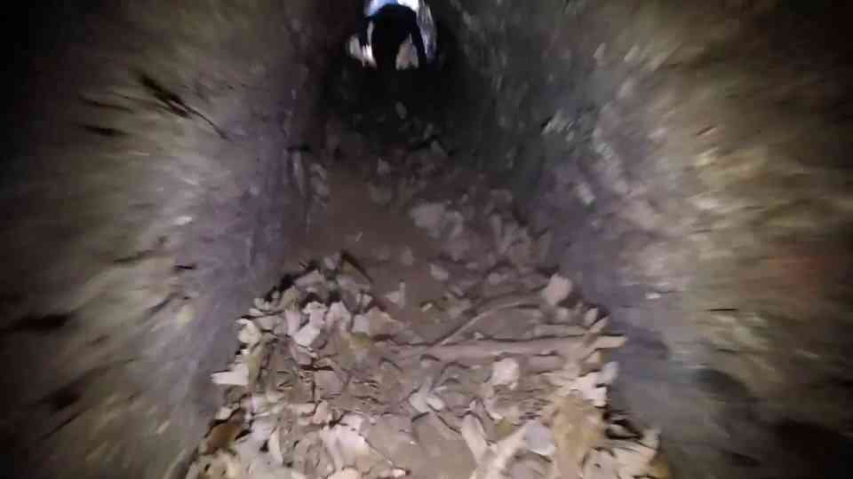 What was found at the bottom of this steep gold mine shaft