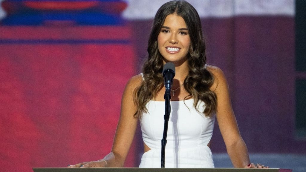 Kai Trump pairs dress held up by just strings with surprise accessory