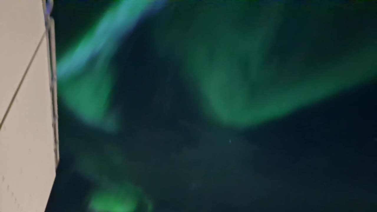 Aurora borealis lights the night sky in Reykjavik, Iceland