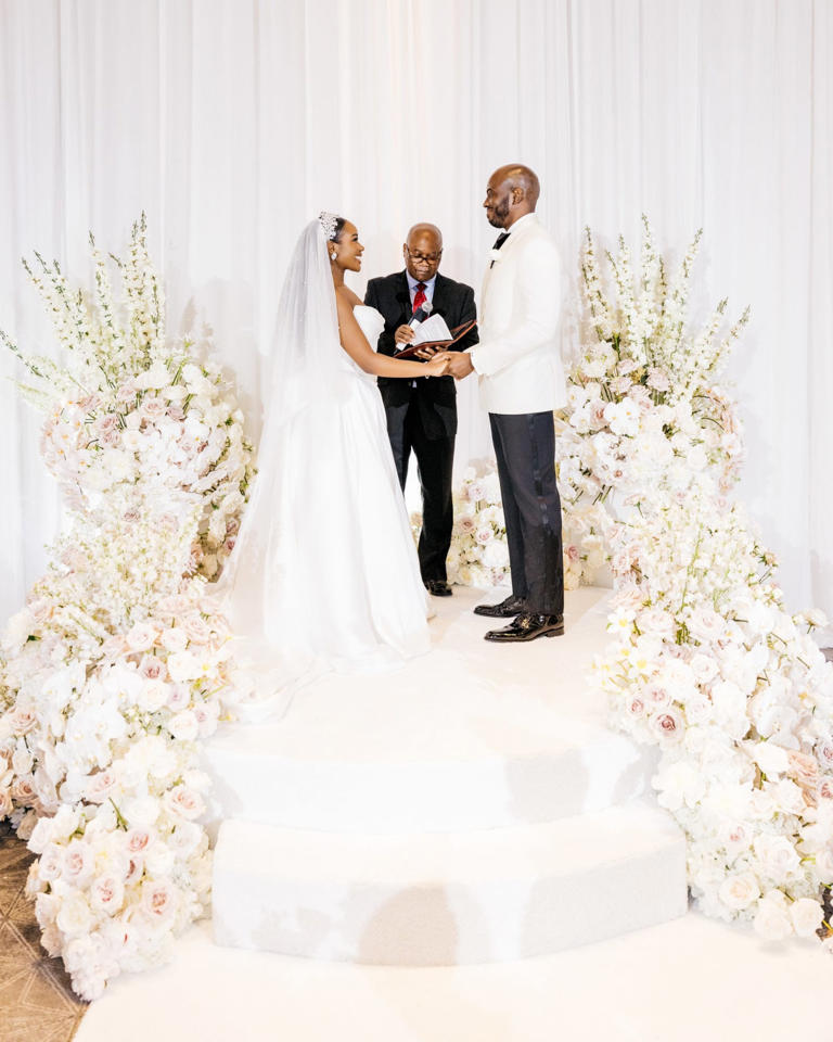A flower-draped baby grand piano provided the ceremony soundtrack at ...