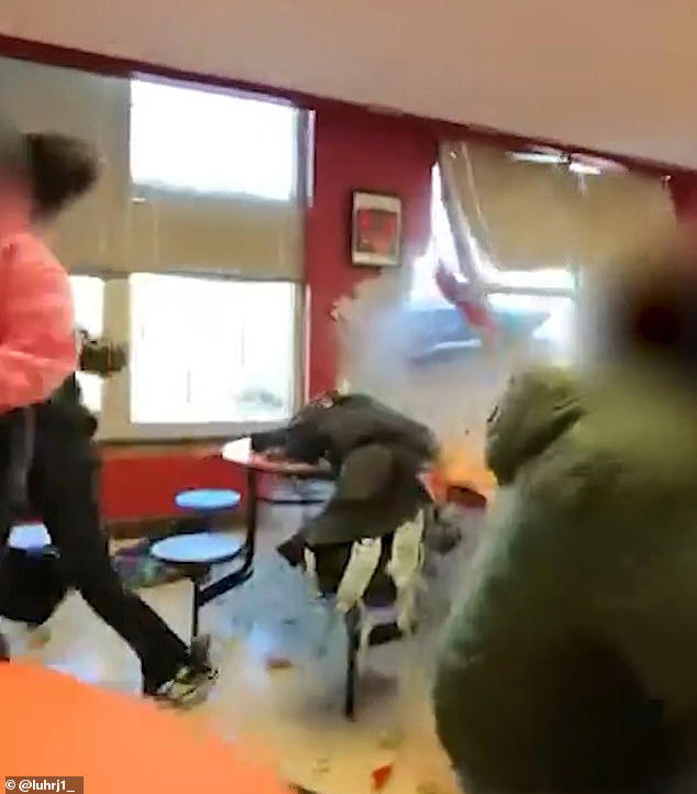 Video shows car smash through brick wall of school cafeteria as ...