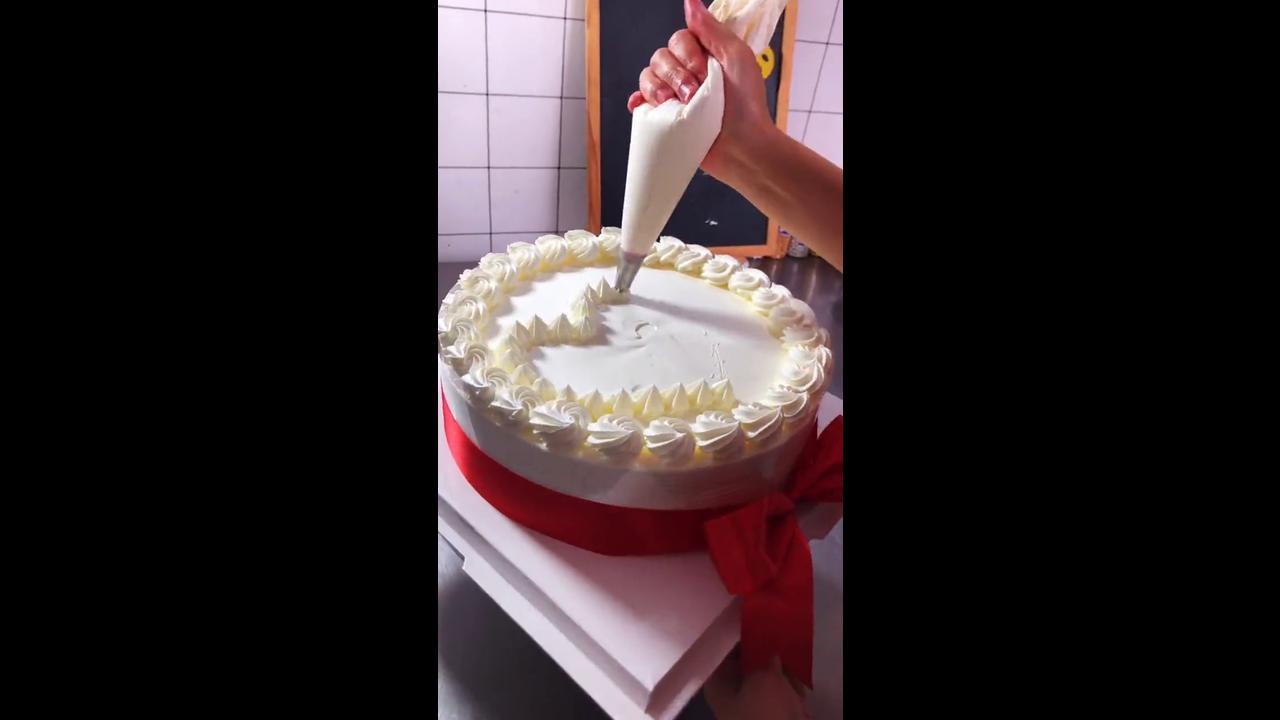 Making White With Fruits Cake