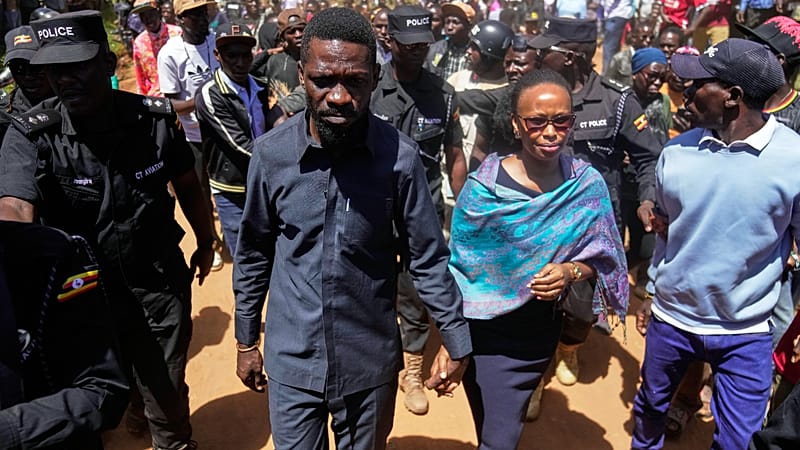 Uganda election: Bobi Wine and wife cast votes, Wine slams internet ...