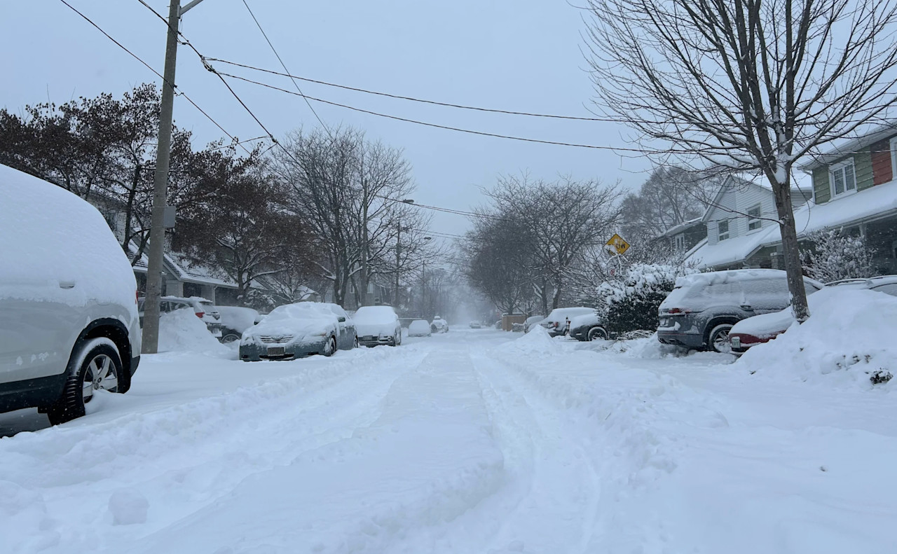 Buried: Major snowstorm brings road closures, flight cancellations to ...