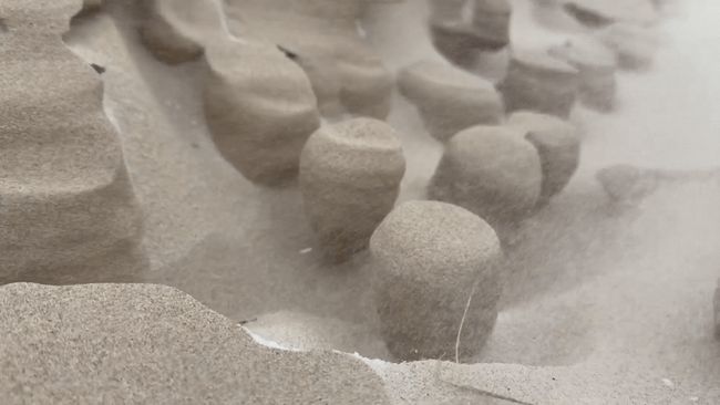 Freezing winds shape sand into intriguing shapes along Lake Michigan shore