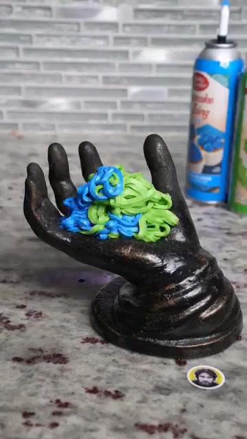 Hand of God vs green cupcake icing