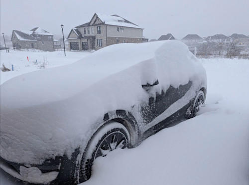 Buried: Major snowstorm brings road closures, flight cancellations to ...