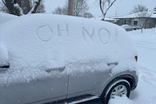 Buried: Major snowstorm brings road closures, flight cancellations to ...