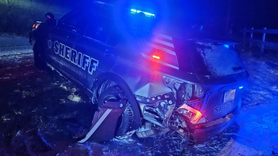 Wisconsin squad car hit while helping with crash during snowy conditions