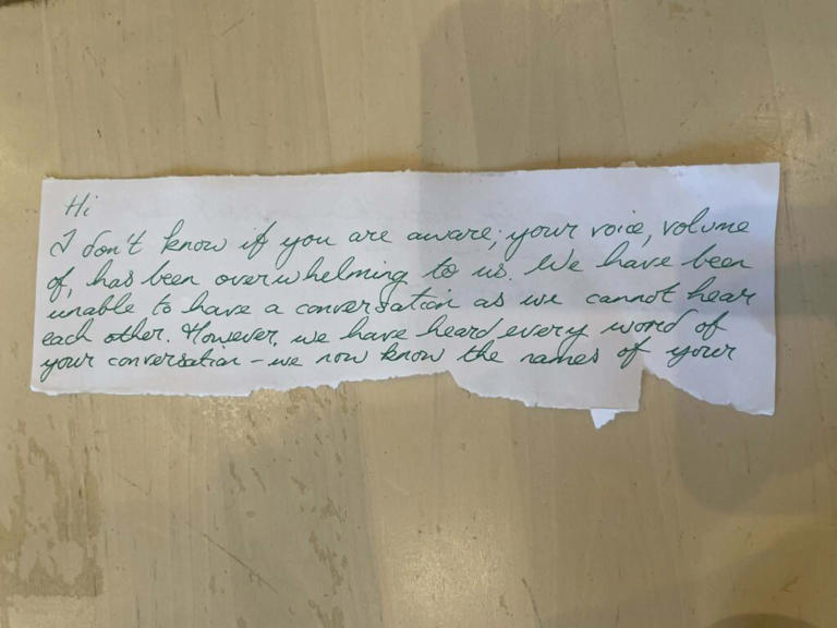 Woman mortified after café stranger hands her savage note