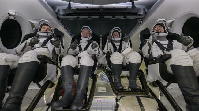 Space station crew returns to Earth after first ever medical evacuation