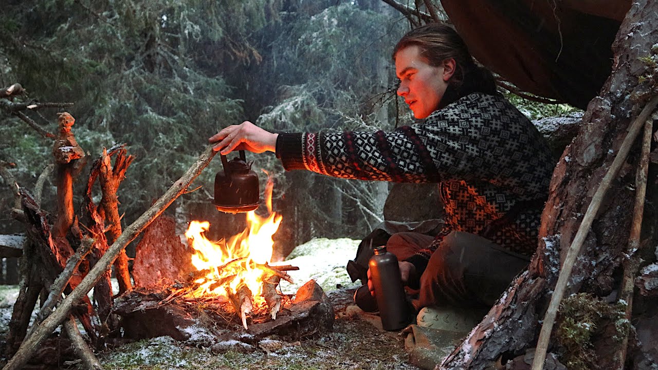 Surviving first snow: Solo bushcraft cooking and cold-water trials