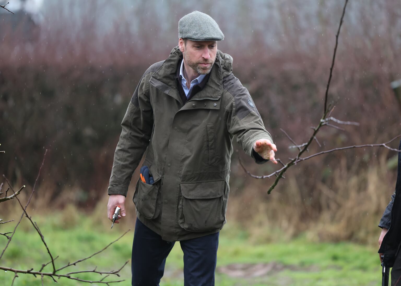 Prince of Wales branches out into tree-pruning on visit to family farm