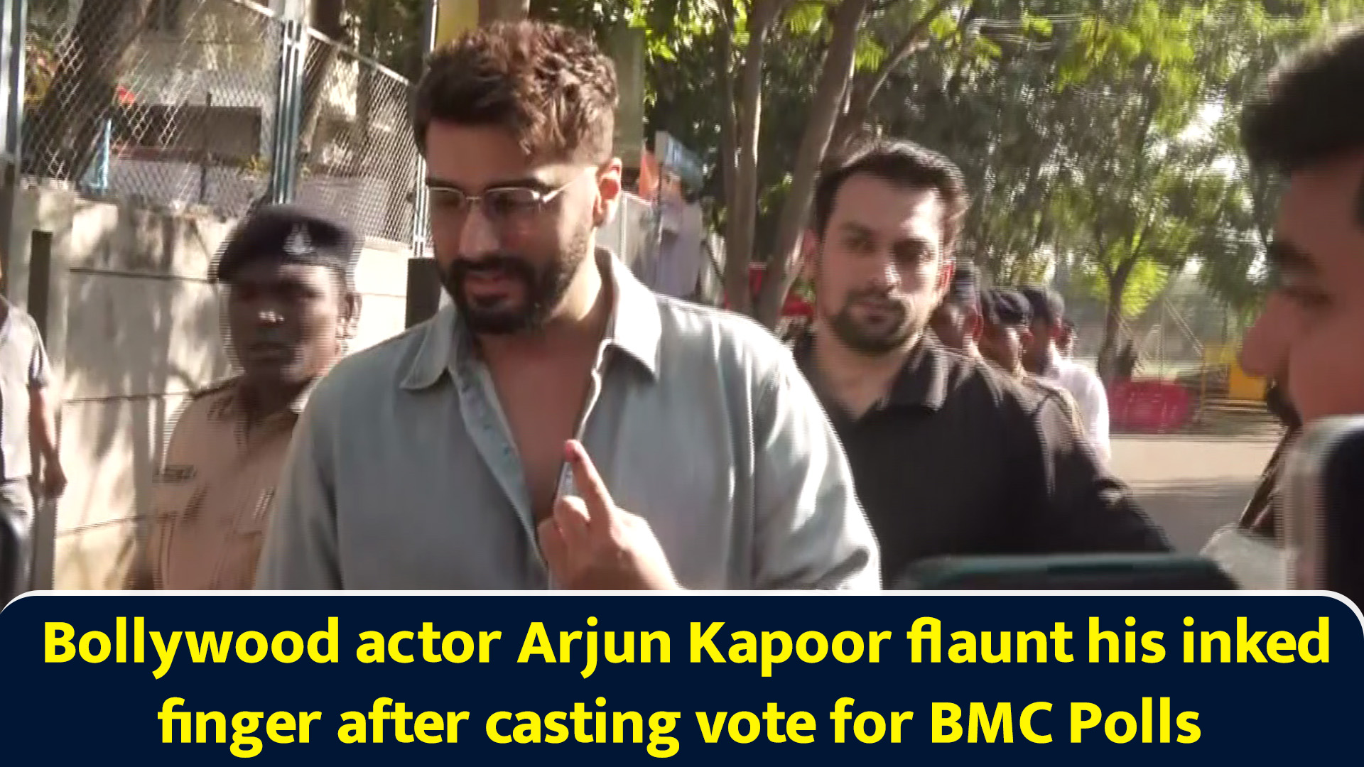 Bollywood actor Arjun Kapoor flaunt his inked finger after casting vote ...
