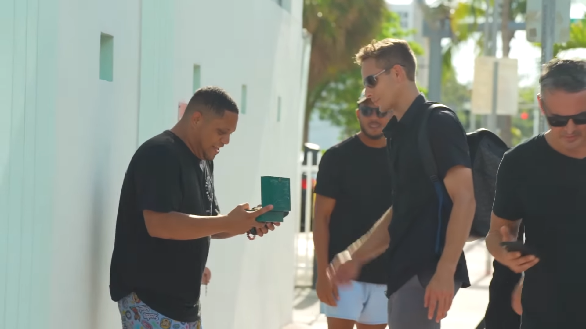 Asking what time it is, then gifting a Rolex