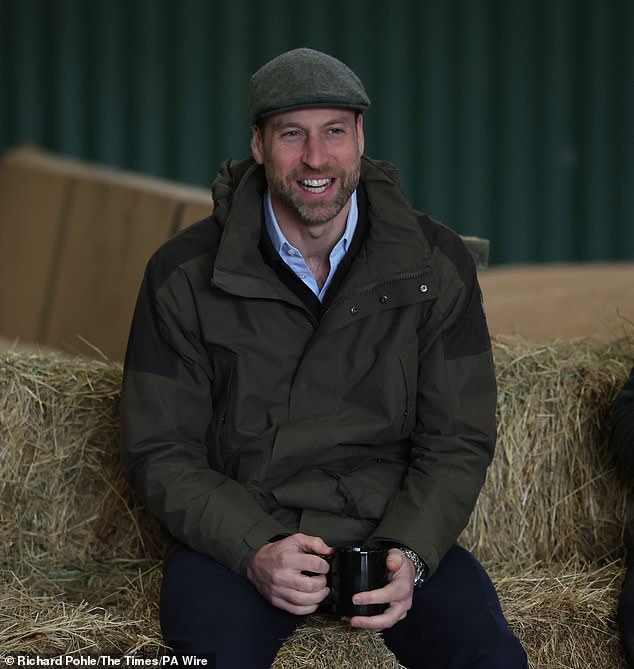 Prince William mucks in: Royal goes rural as he helps out on the farm