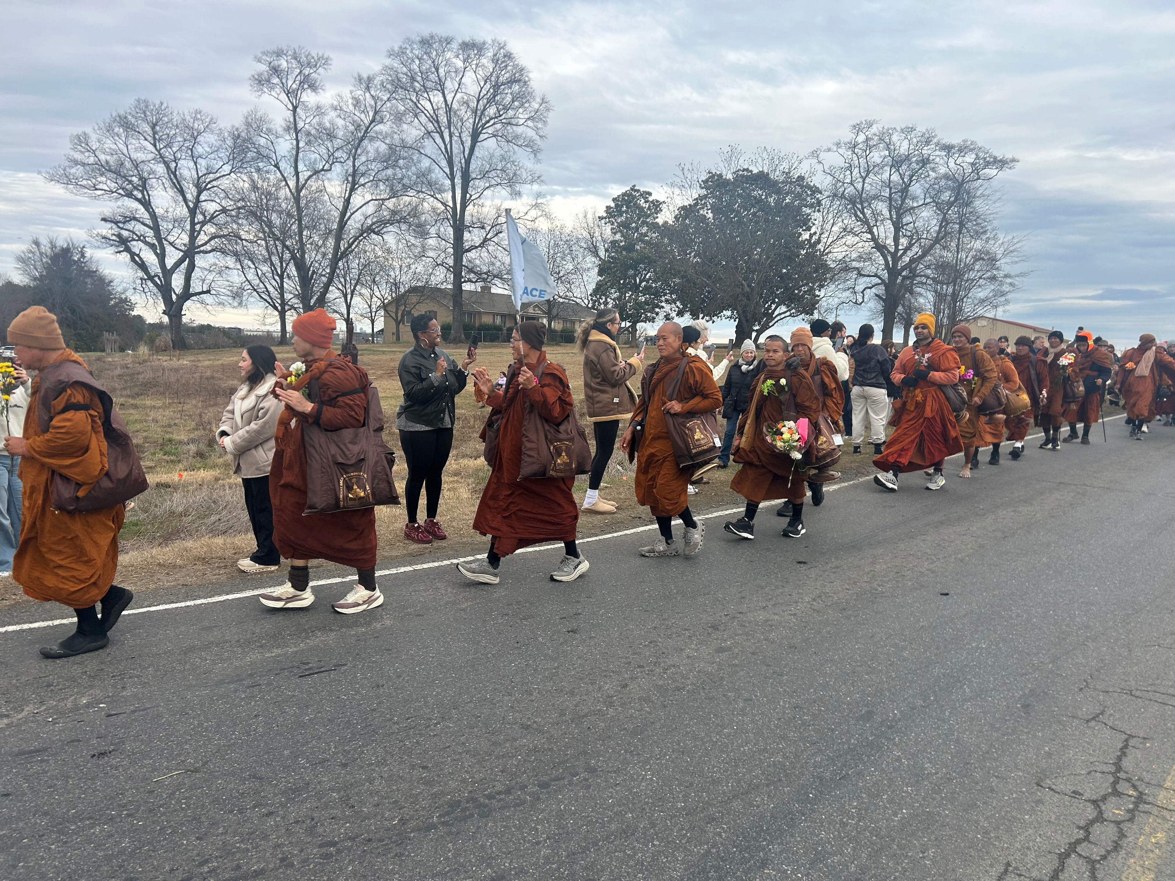 Hundreds of people travel to Pineville to see Buddhist monks on their ...