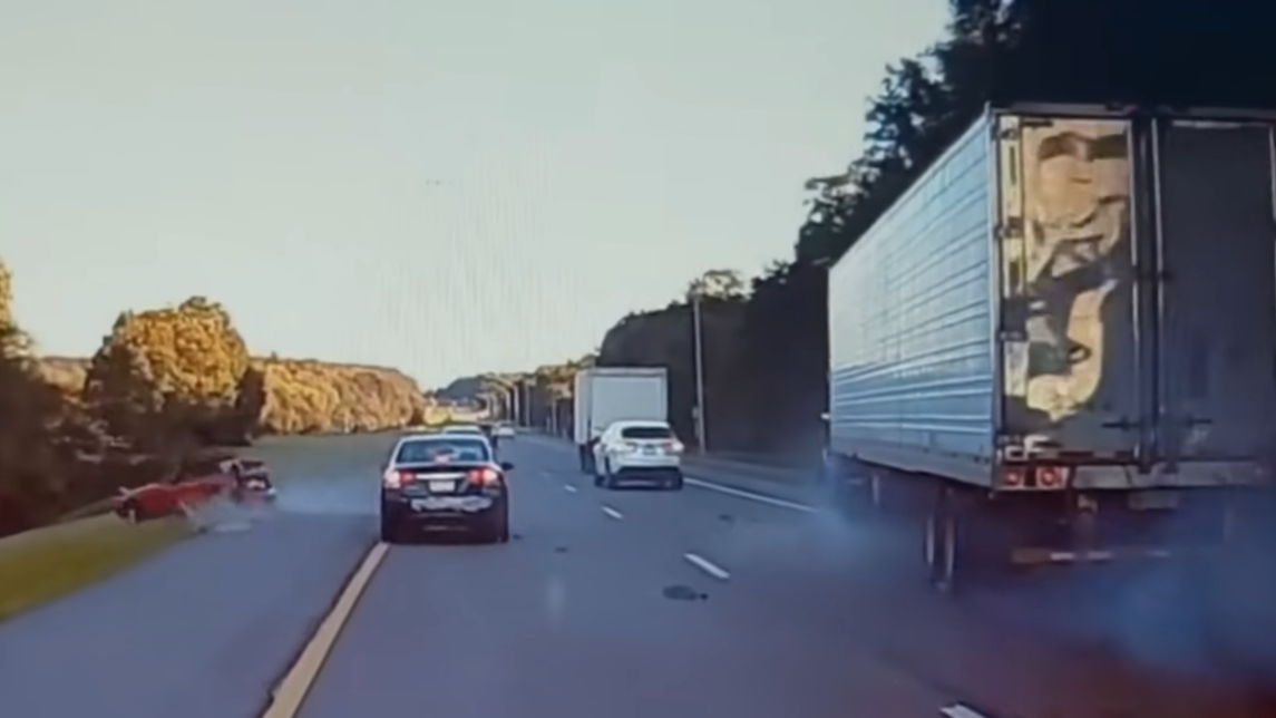 A big rig rear-ended a car in seconds on camera