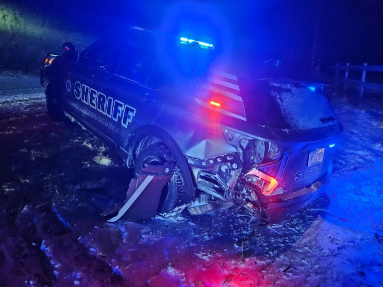 Wisconsin squad car hit while helping with crash during snowy conditions