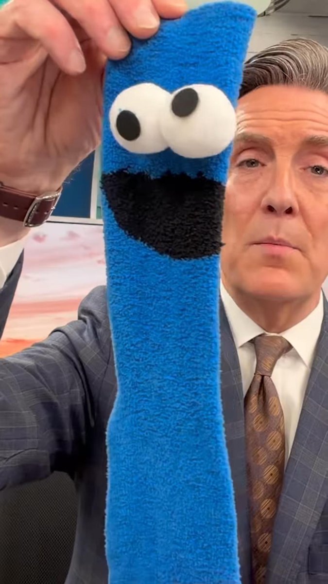 Watch: News anchor's collection of 1,531 pairs of socks earns world record