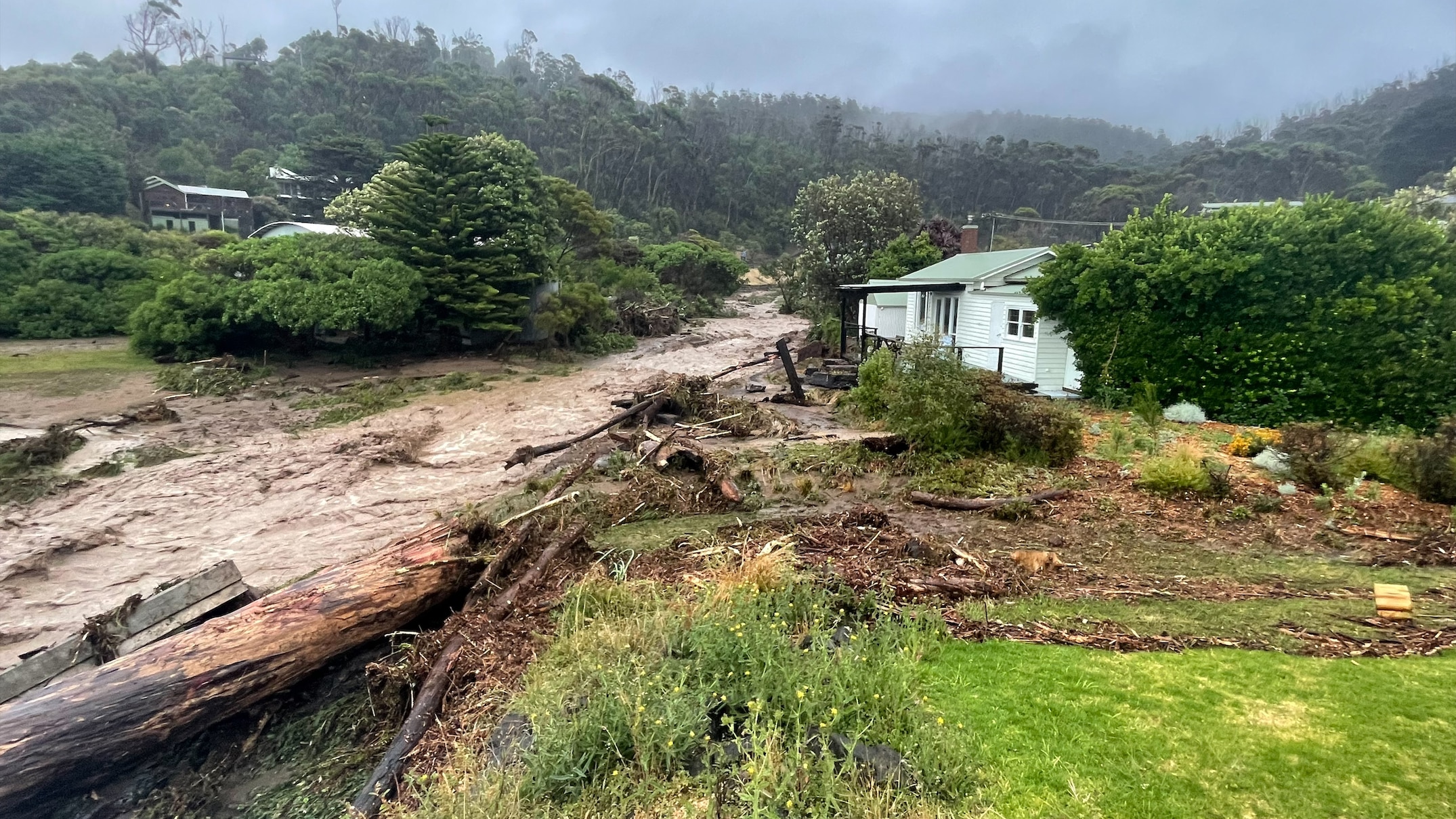 Communties recovering from flash flooding after rainfall records ...
