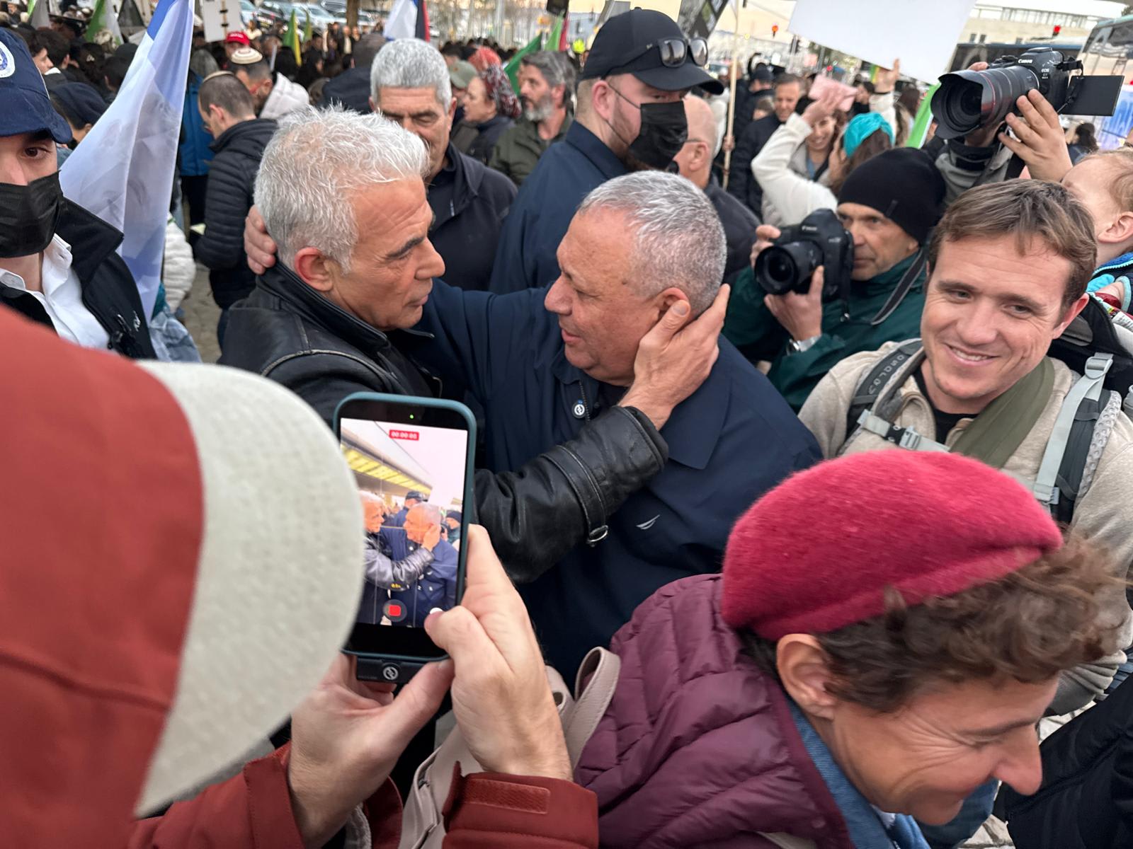 Lapid, Eisenkot, and Bennett back reservists at Jerusalem draft law protest